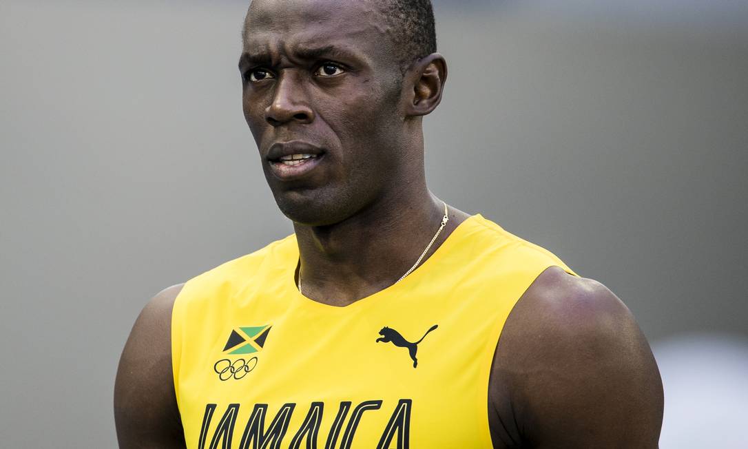 Com facilidade, Bolt passa pela fase eliminatória e vai à semifinal do ...