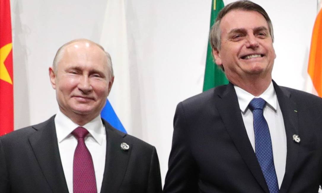 'Não se meta nas eleições americanas', diz Trump, rindo, a Putin ...