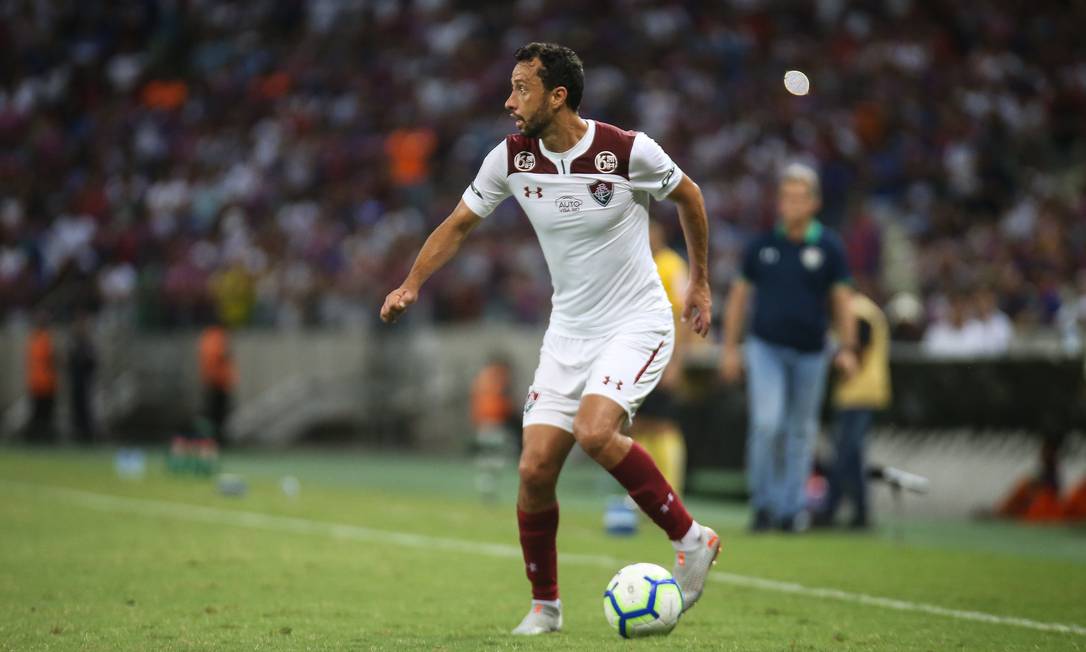 Titular no Fluminense, Nenê quase dobra média de minutos em campo em ...