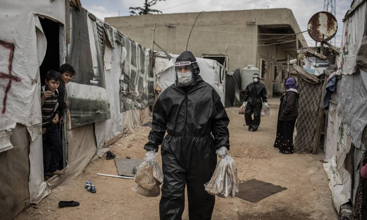 Imagens da pandemia da Covid-19 pelo mundo - Jornal O Globo